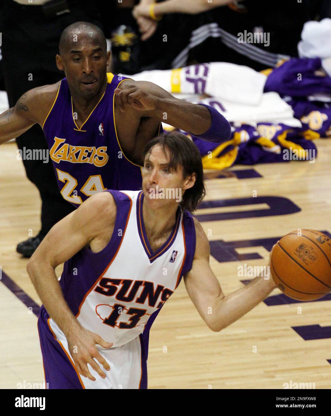FILE - In this May 23, 2010, Phoenix Suns guard Steve Nash (13) passes ...