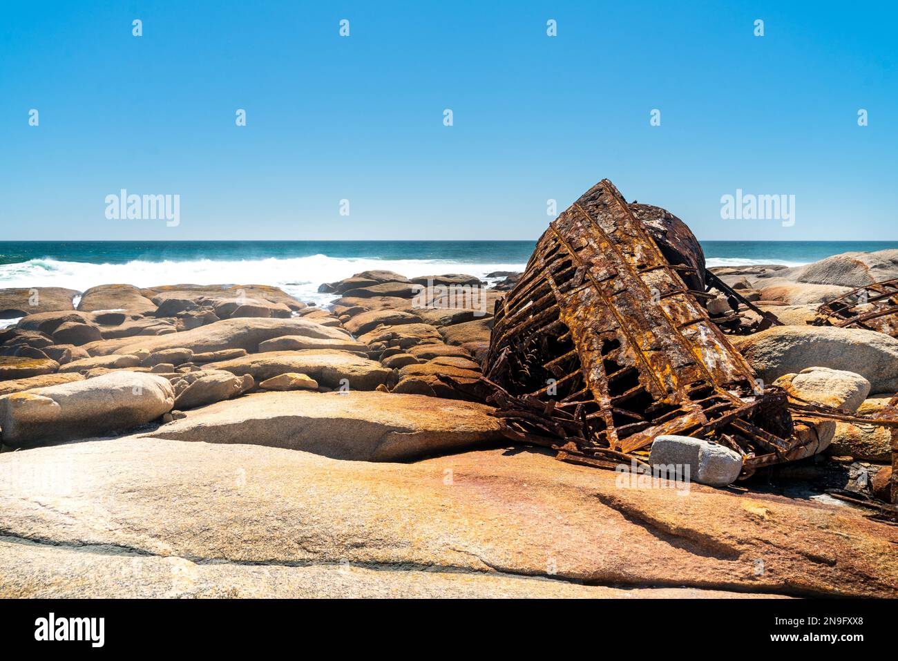 The wreck of the Aristea lies on the rocks on the Atlantic Ocean coast ...