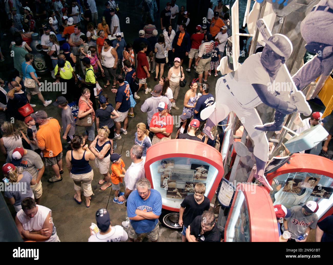 Fans crowd the concourse at Comerica Park to take shelter from a ...