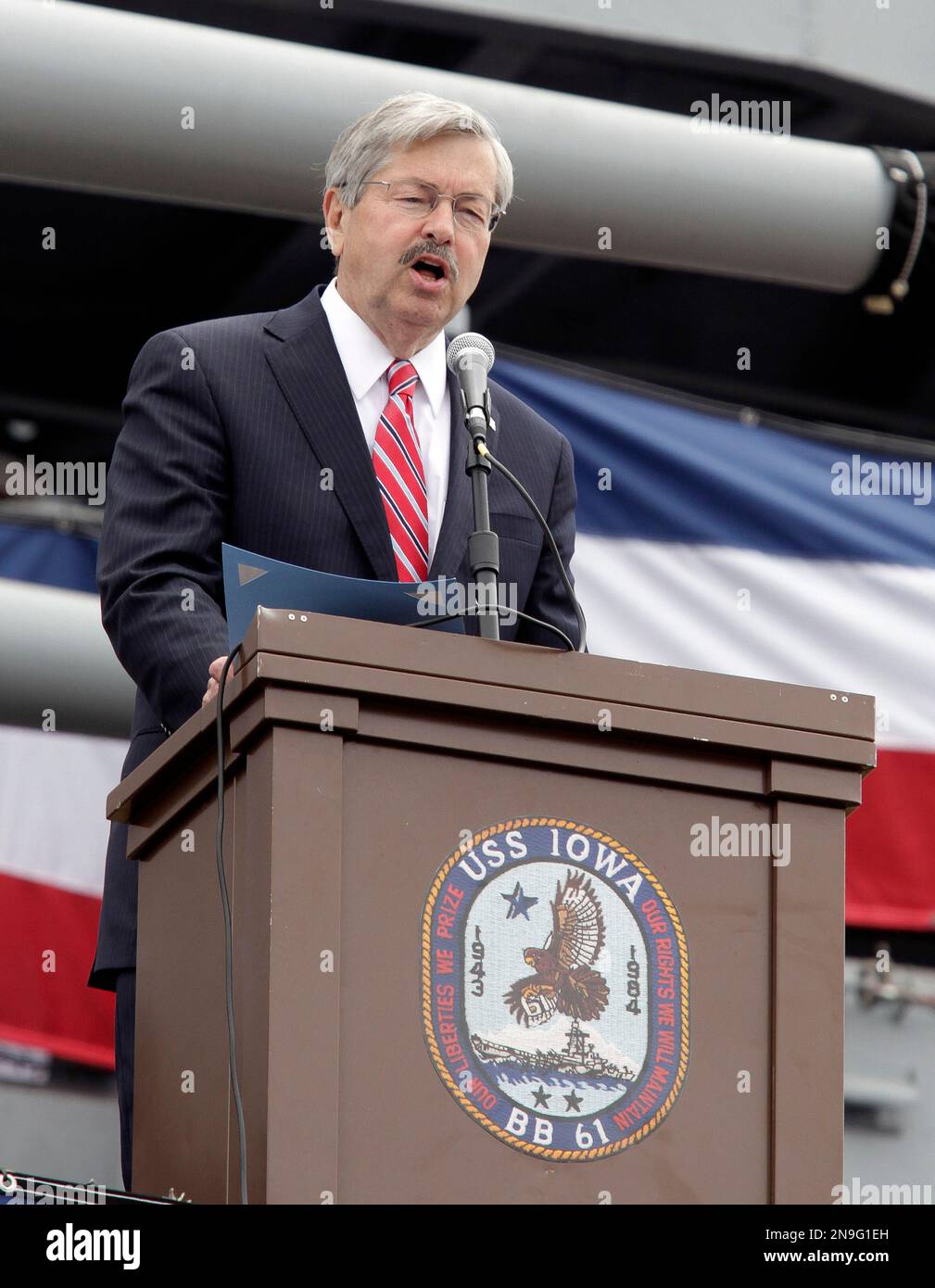 Iowa Gov. Terry Branstad talks during the commissioning ceremony for ...