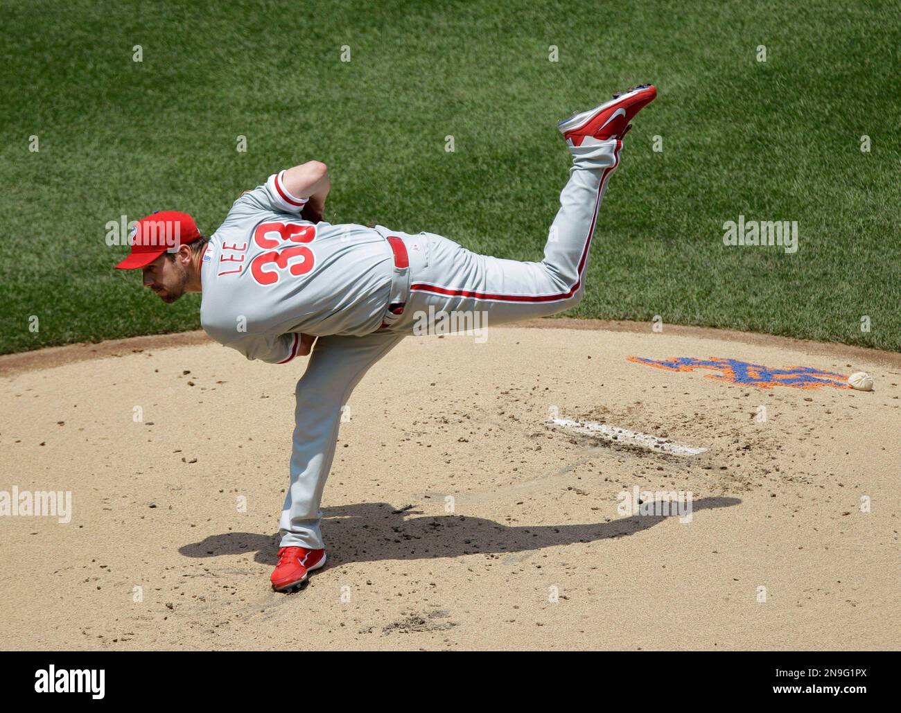 Philadelphia Phillies starting pitcher Cliff Lee follows through in the ...