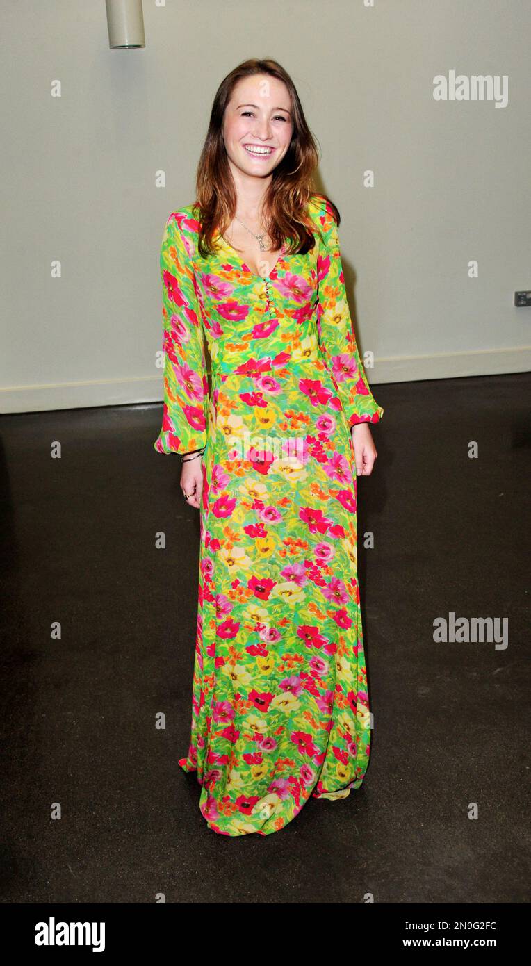 Rebecca Rowe poses at Aston Martin Unveils the Vanquish, London Film ...
