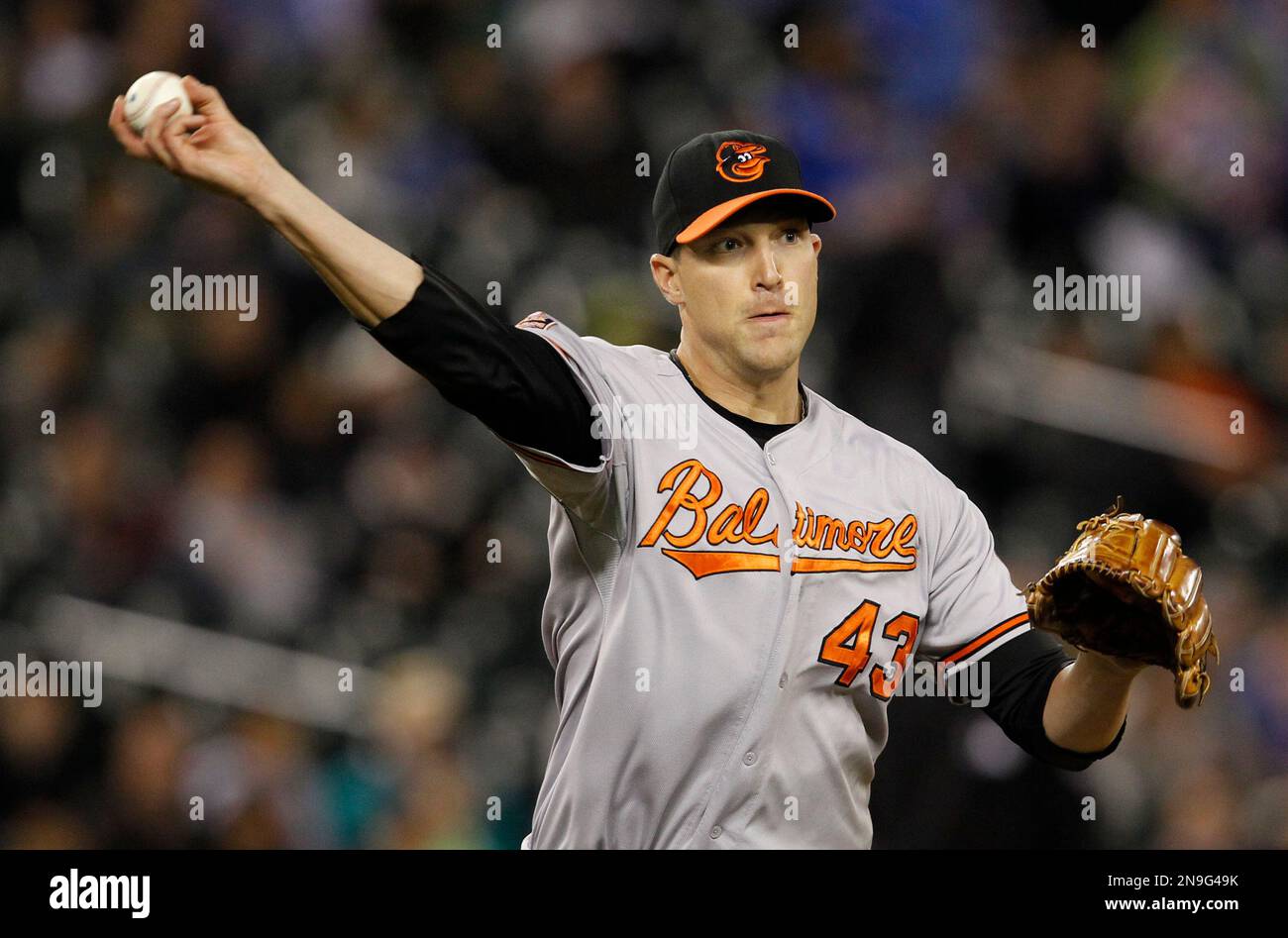 Baltimore Orioles relief pitcher Jim Johnson fires to first for an out ...