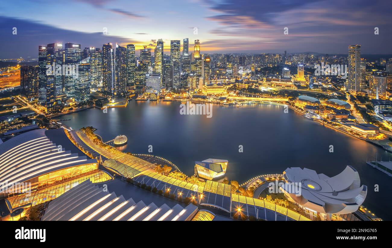 A bird's eye view of Marina Bay Park with illuminated buildings during ...