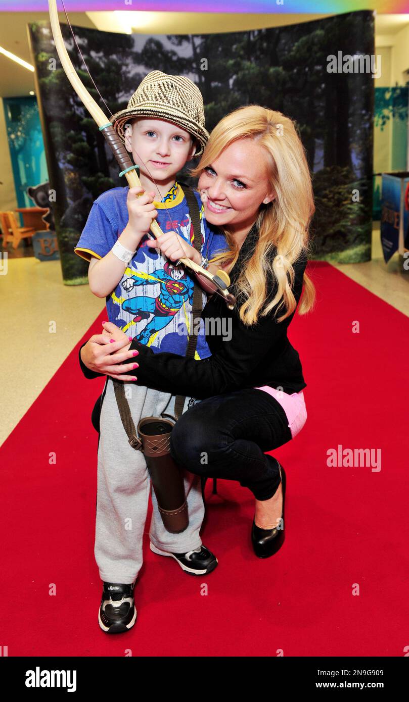 Joshua Bond, Emma Bunton poses as patients celebrate the opening of a ...