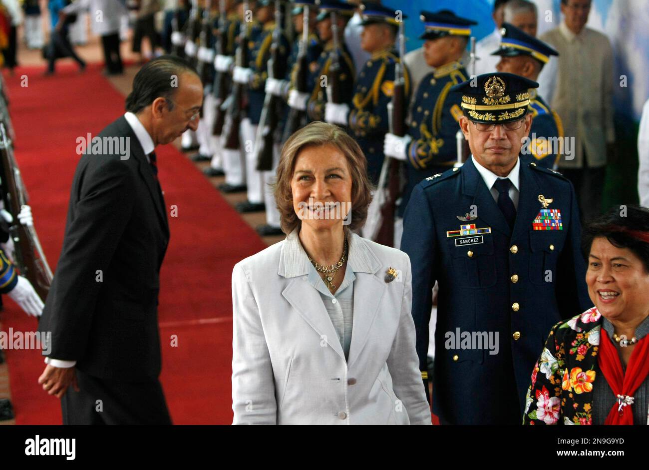 Queen Sofia of Spain, center, smiles upon arrivall at the Ninoy Aquino ...