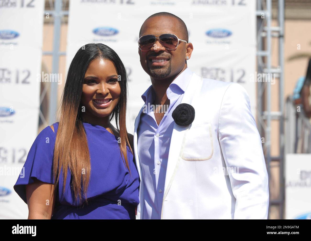 Michelle McCain, left, and Mike Epps arrive at the BET Awards on Sunday ...