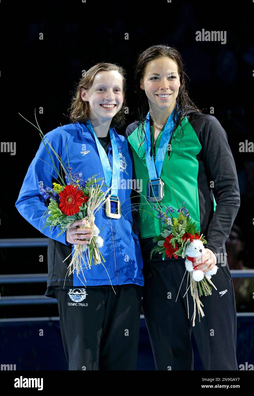 Kathleen Ledecky, left, and Kate Ziegler pose during the medal ceremony ...