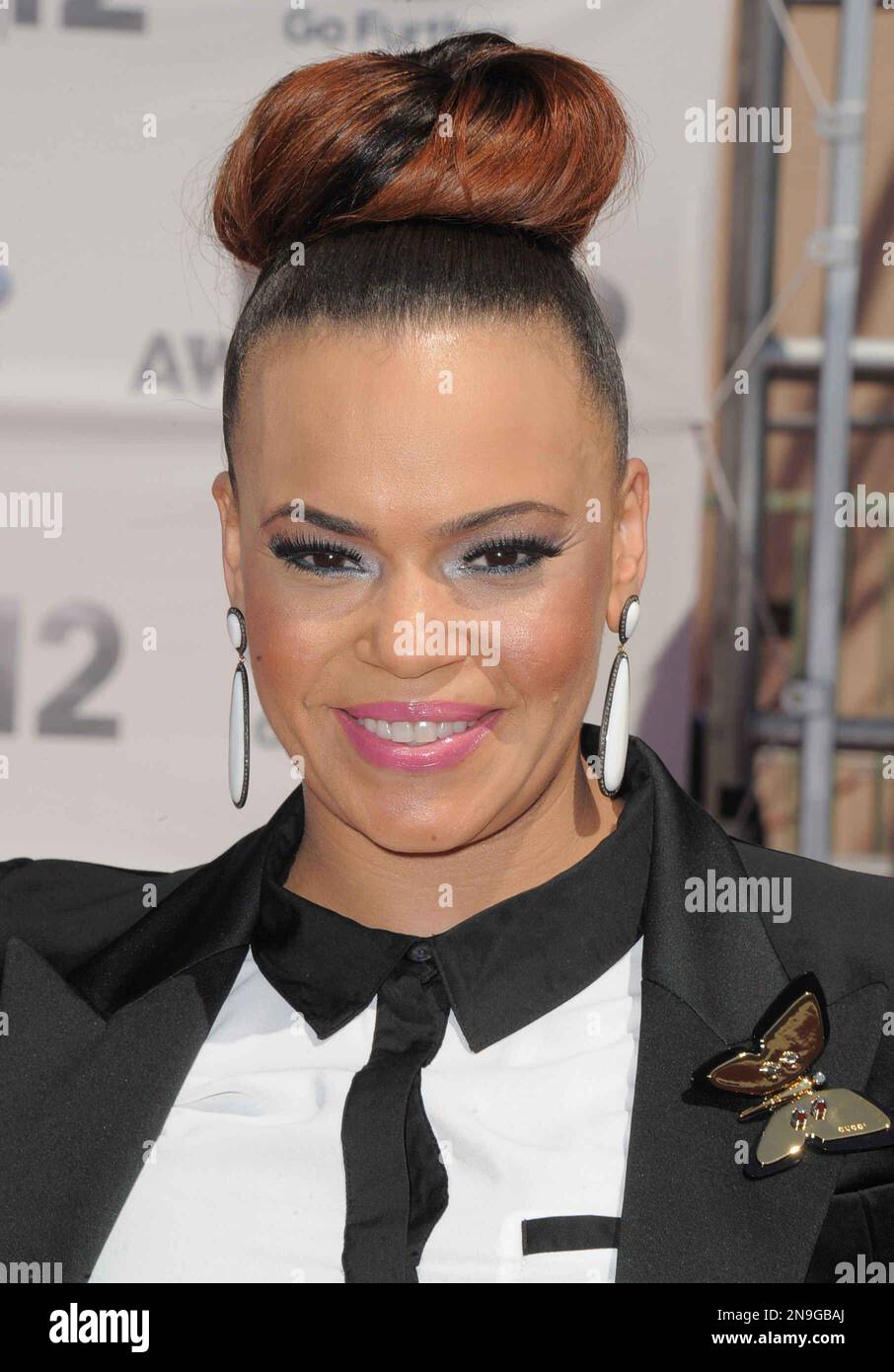 Faith Evans arrives at the BET Awards on Sunday, July 1, 2012, in Los ...