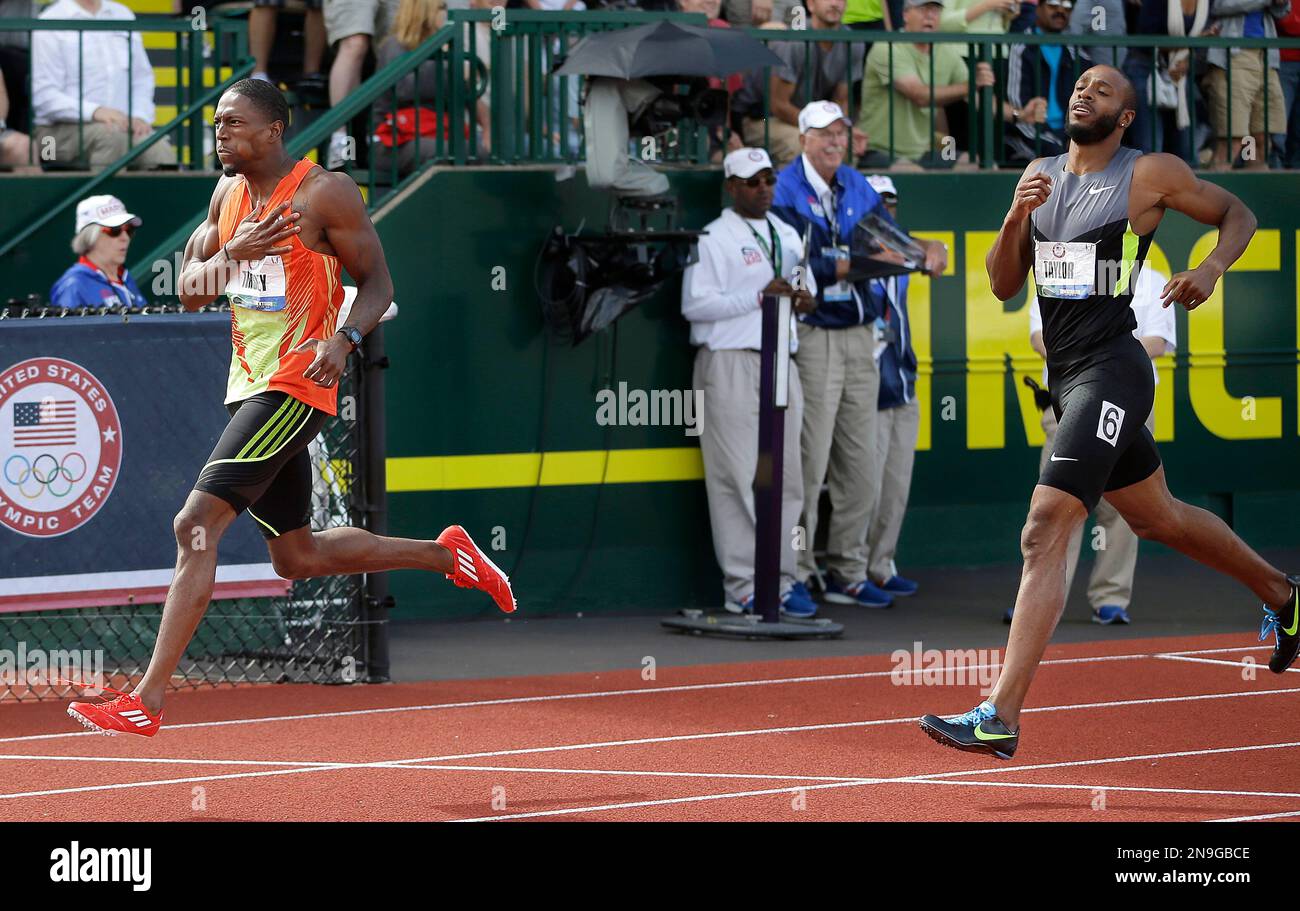 Michael Tinsley and Angelo Taylor finish the men's 400 meter hurdles at ...