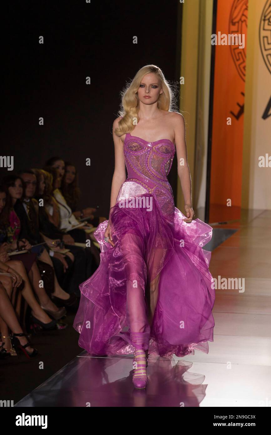 A model wears a creation by fashion designer Donatella Versace during ...