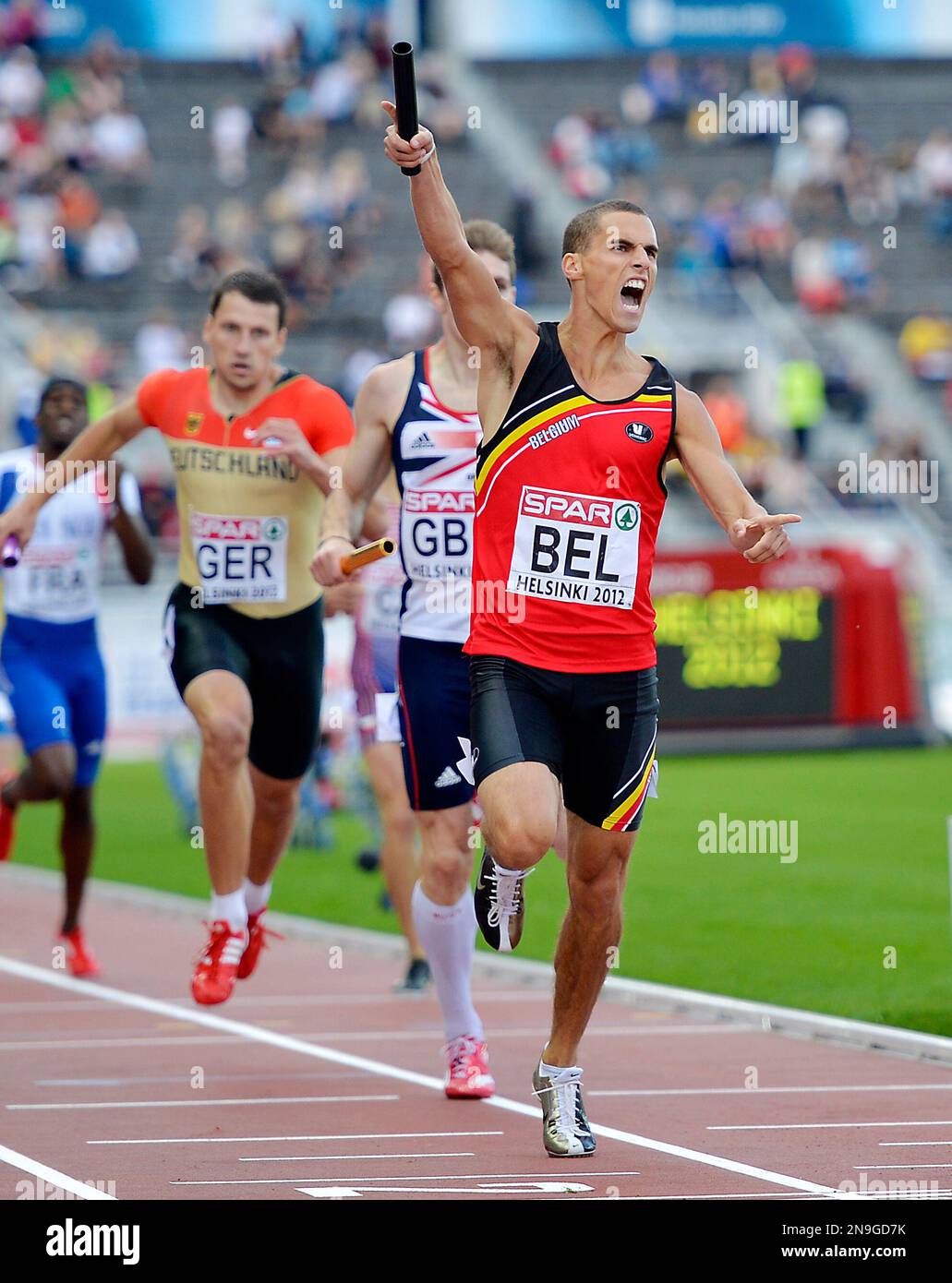 Belgium's Kevin Borlee crosses the finish line to win with his team the ...