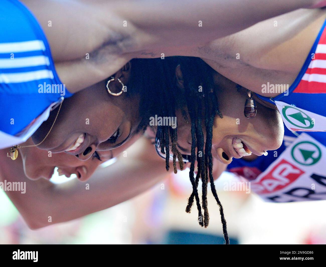 Members of team France stand together after winning silver in the Women ...