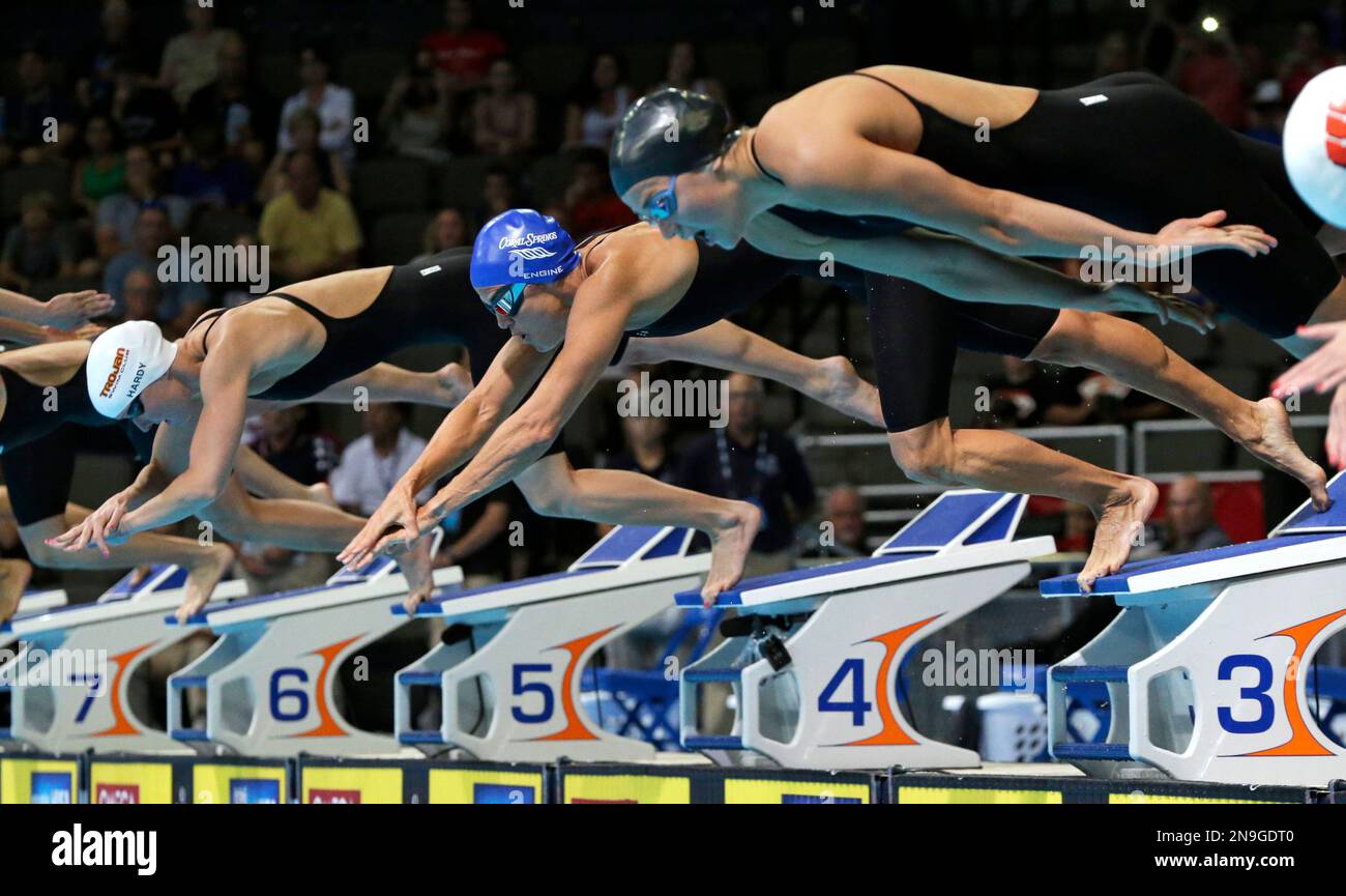Jessica Hardy, from left, Dara Torres and Liv Jensen dive at the start ...