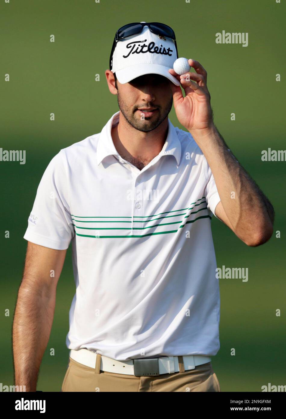 Cameron Tringale acknowledges the gallery after putting on the 14th ...