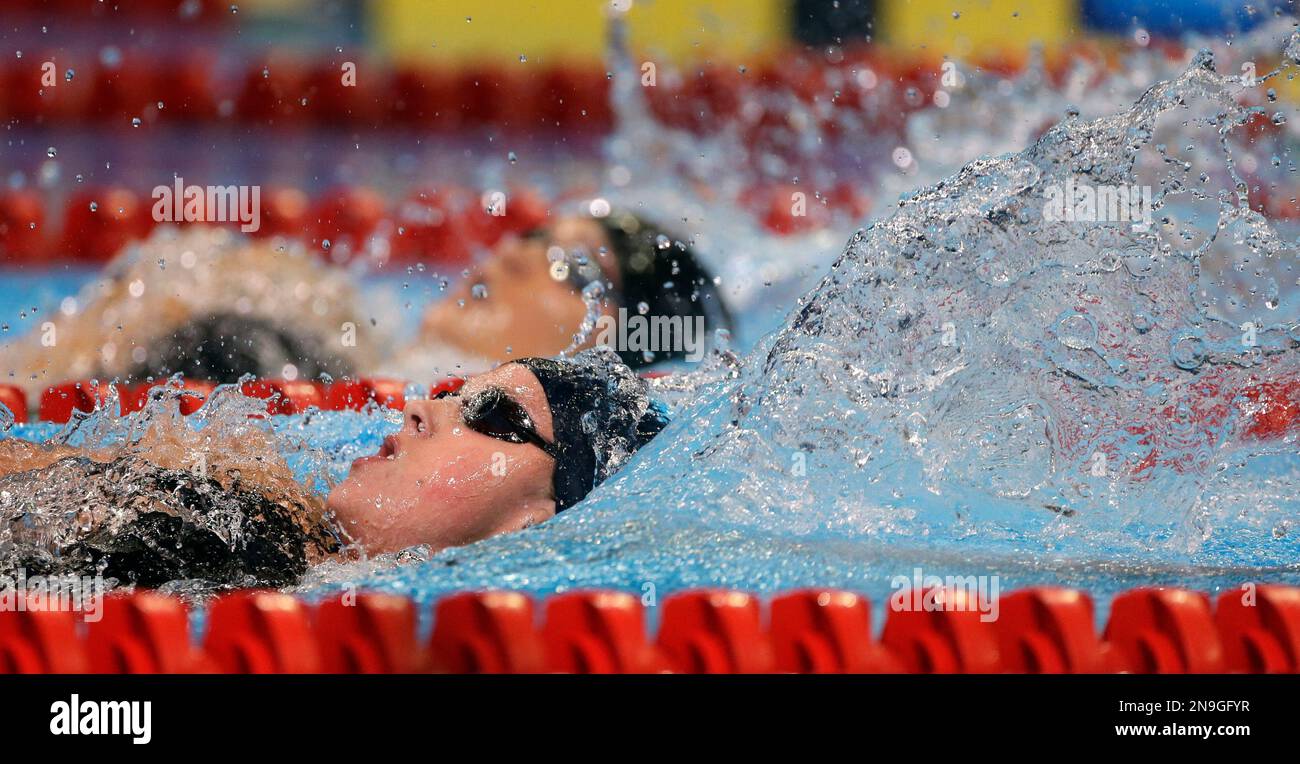 Bonnie Brandon and Elizabeth Pelton, rear, swim in the women's 200 ...