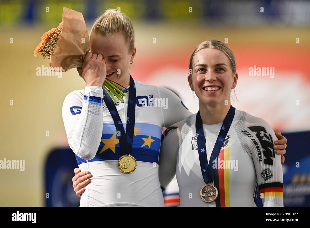 First placed Lea Sophie Friedrich, left, from Germany and third placed ...