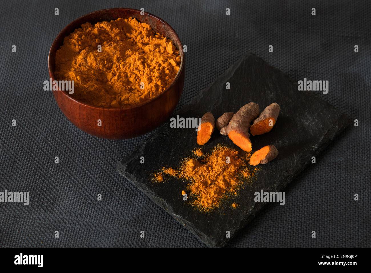 turmeric roots and powder. healthy spice concept Stock Photo - Alamy