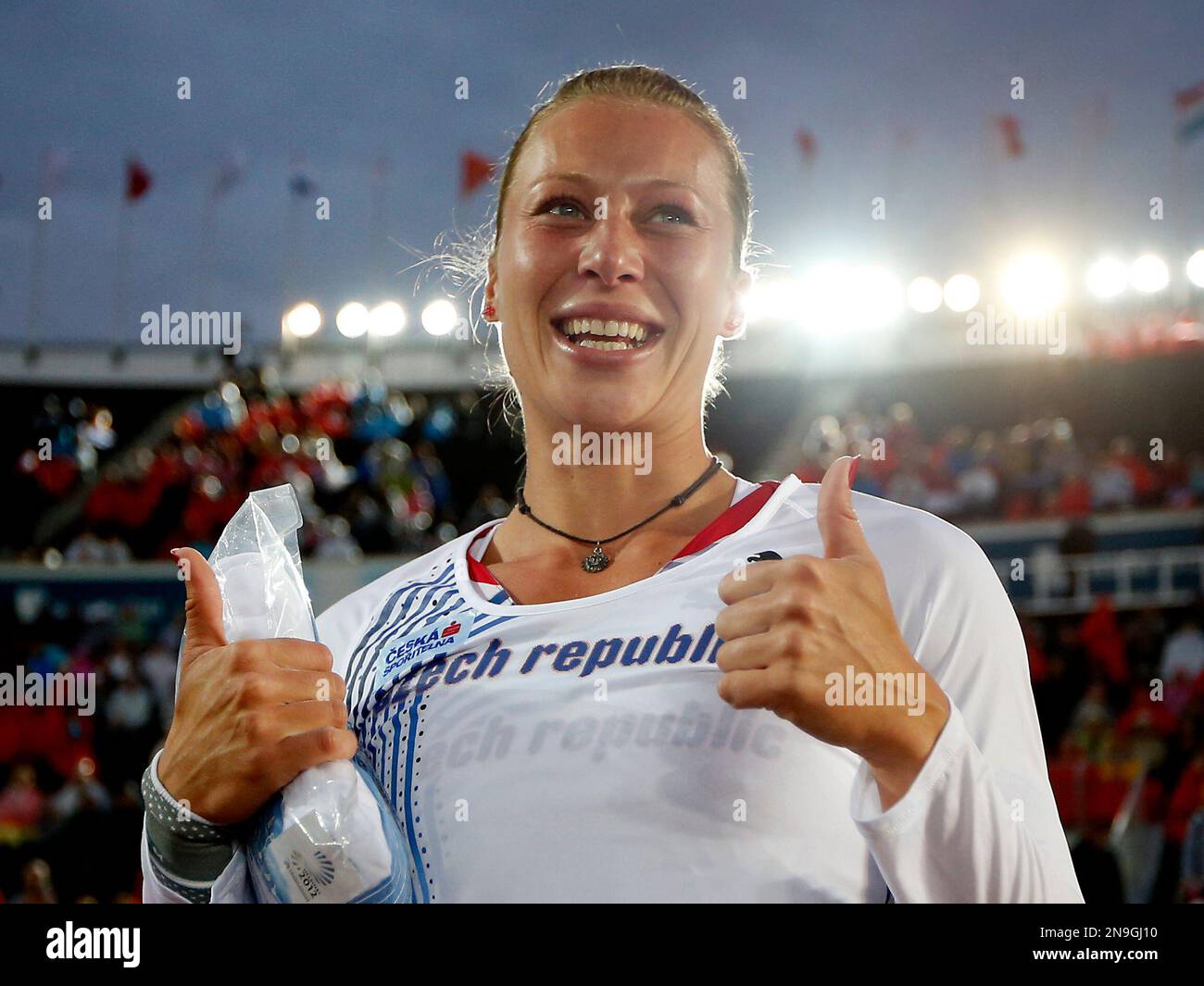 Czech Republic's Jirina Ptacnikova reacts after winning gold in the ...