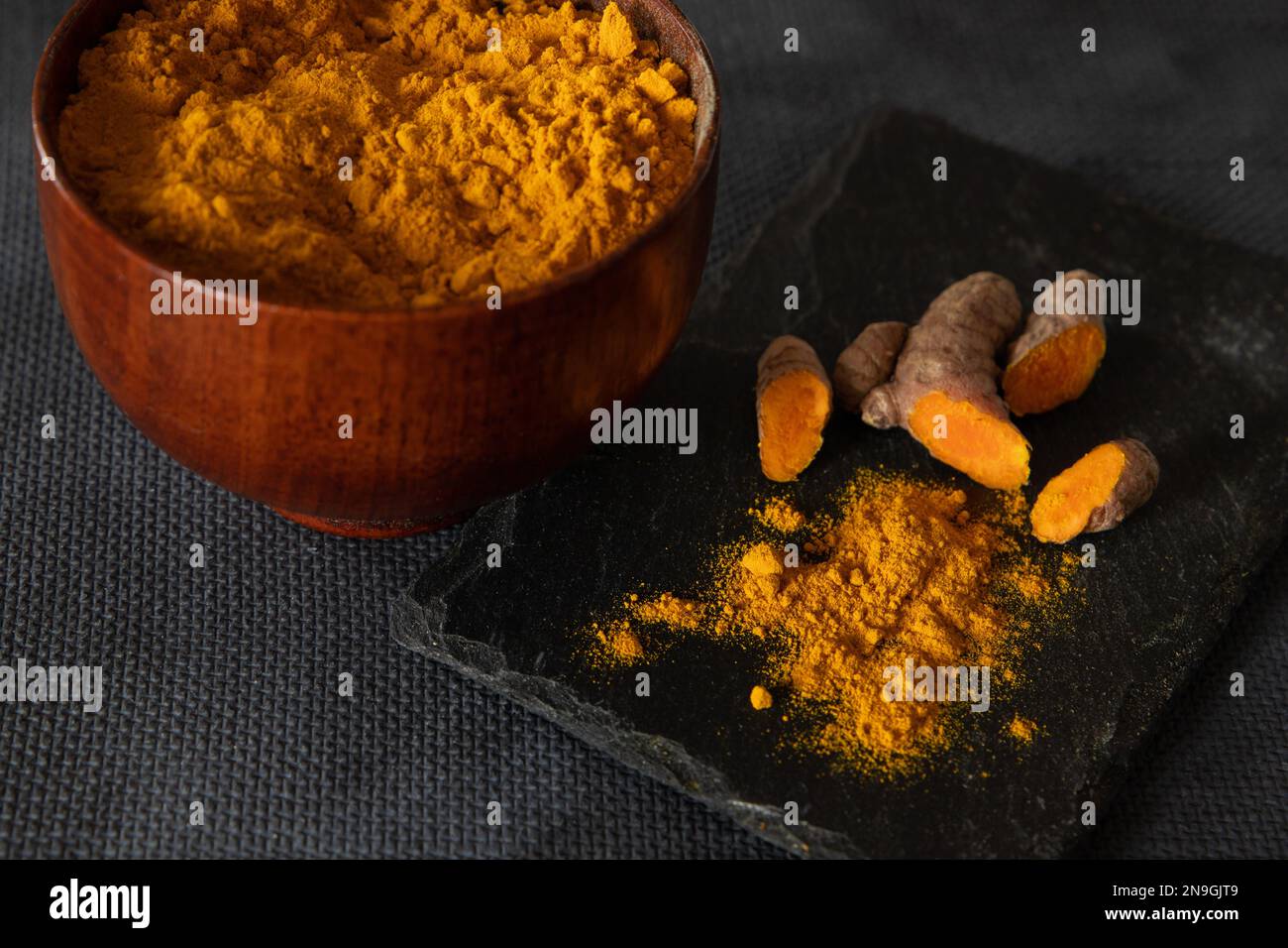turmeric roots and powder. healthy spice concept Stock Photo - Alamy