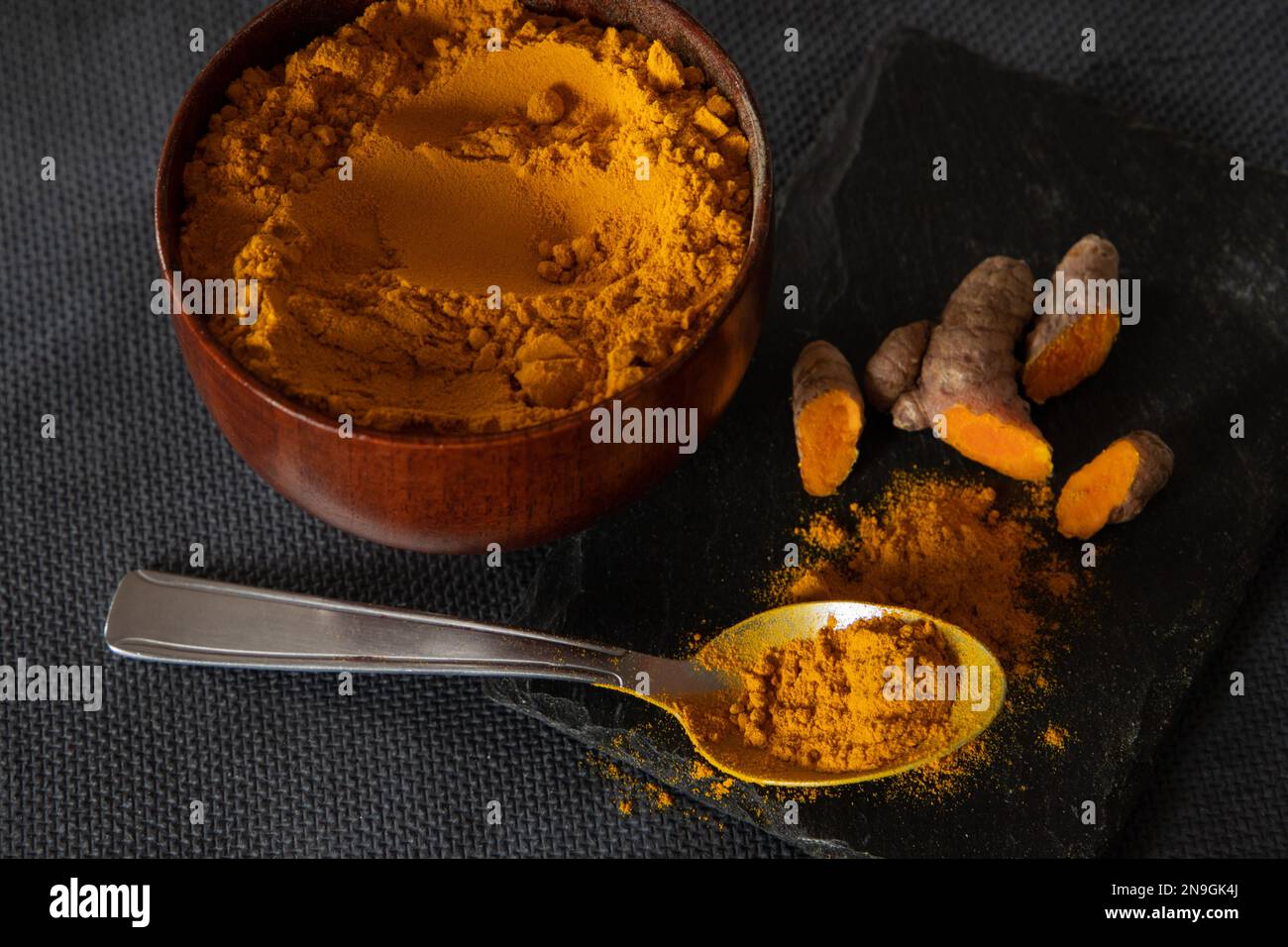 turmeric roots and powder. healthy spice concept Stock Photo - Alamy