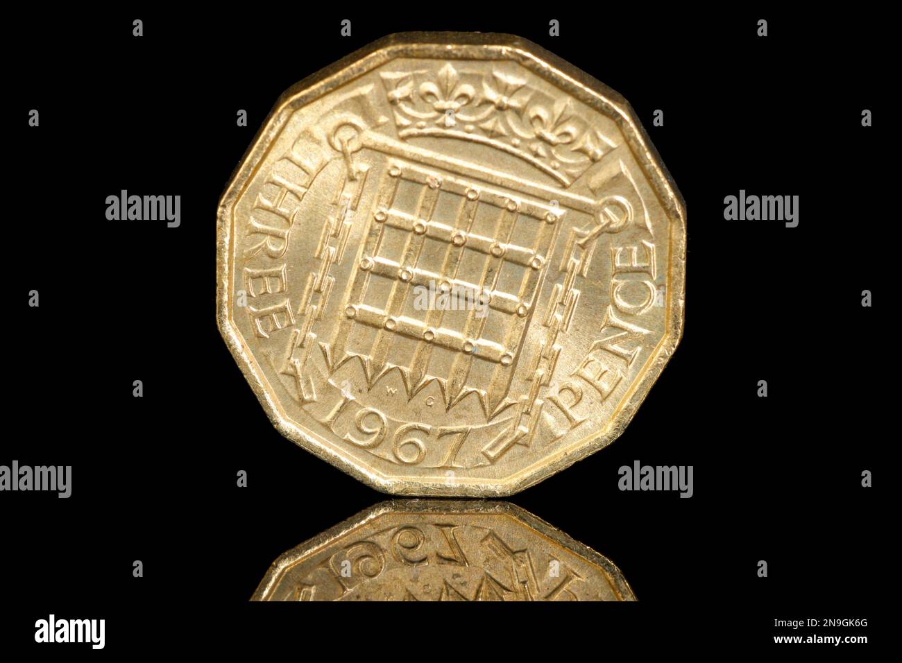 Reverse side of a Threepence coin featuring a crowned portcullis with ...