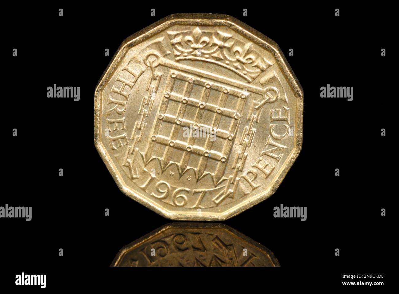 Reverse side of a Threepence coin featuring a crowned portcullis with ...