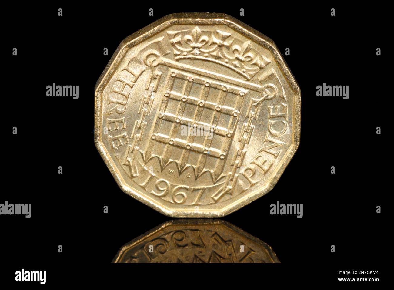 Reverse side of a Threepence coin featuring a crowned portcullis with ...