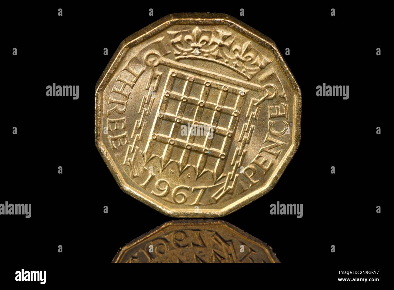 Reverse side of a Threepence coin featuring a crowned portcullis with ...