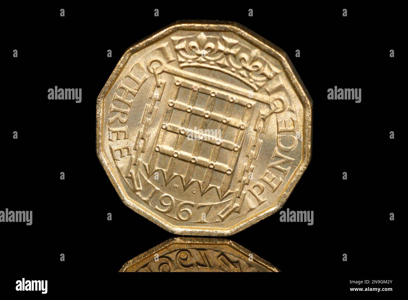 Reverse side of a Threepence coin featuring a crowned portcullis with ...