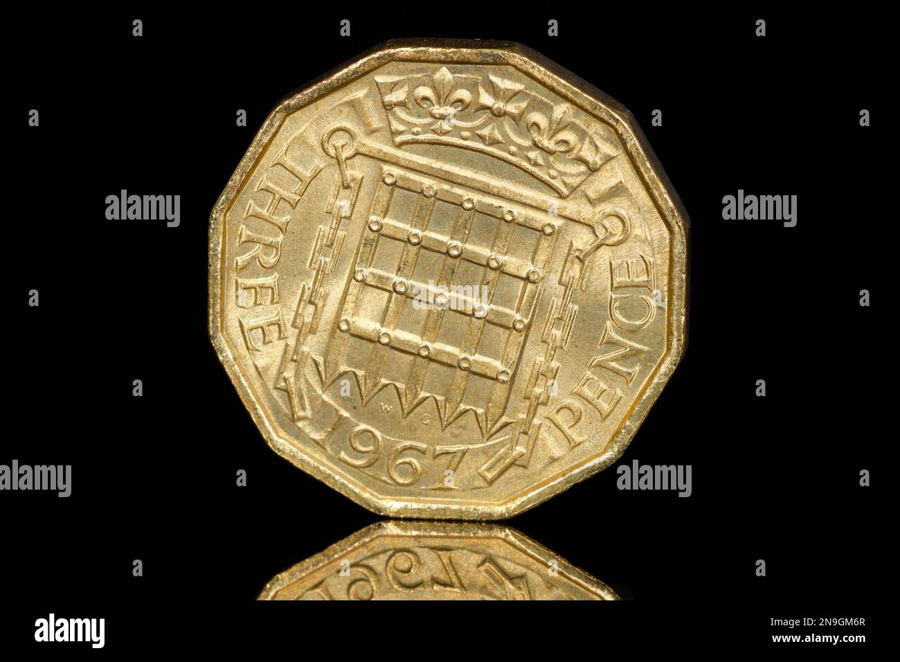 Reverse side of a Threepence coin featuring a crowned portcullis with ...