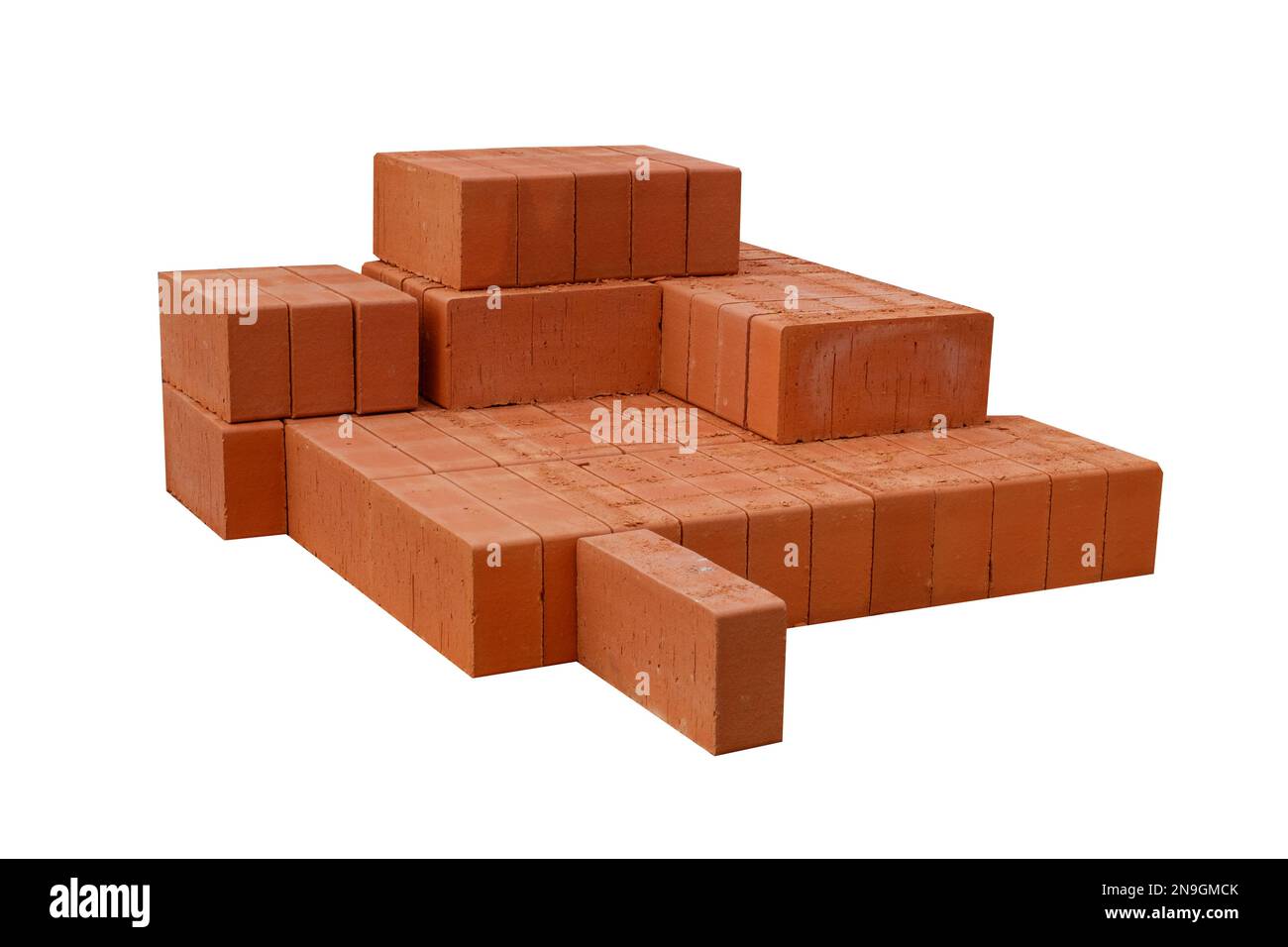 pile of red bricks isolated on white background Stock Photo - Alamy
