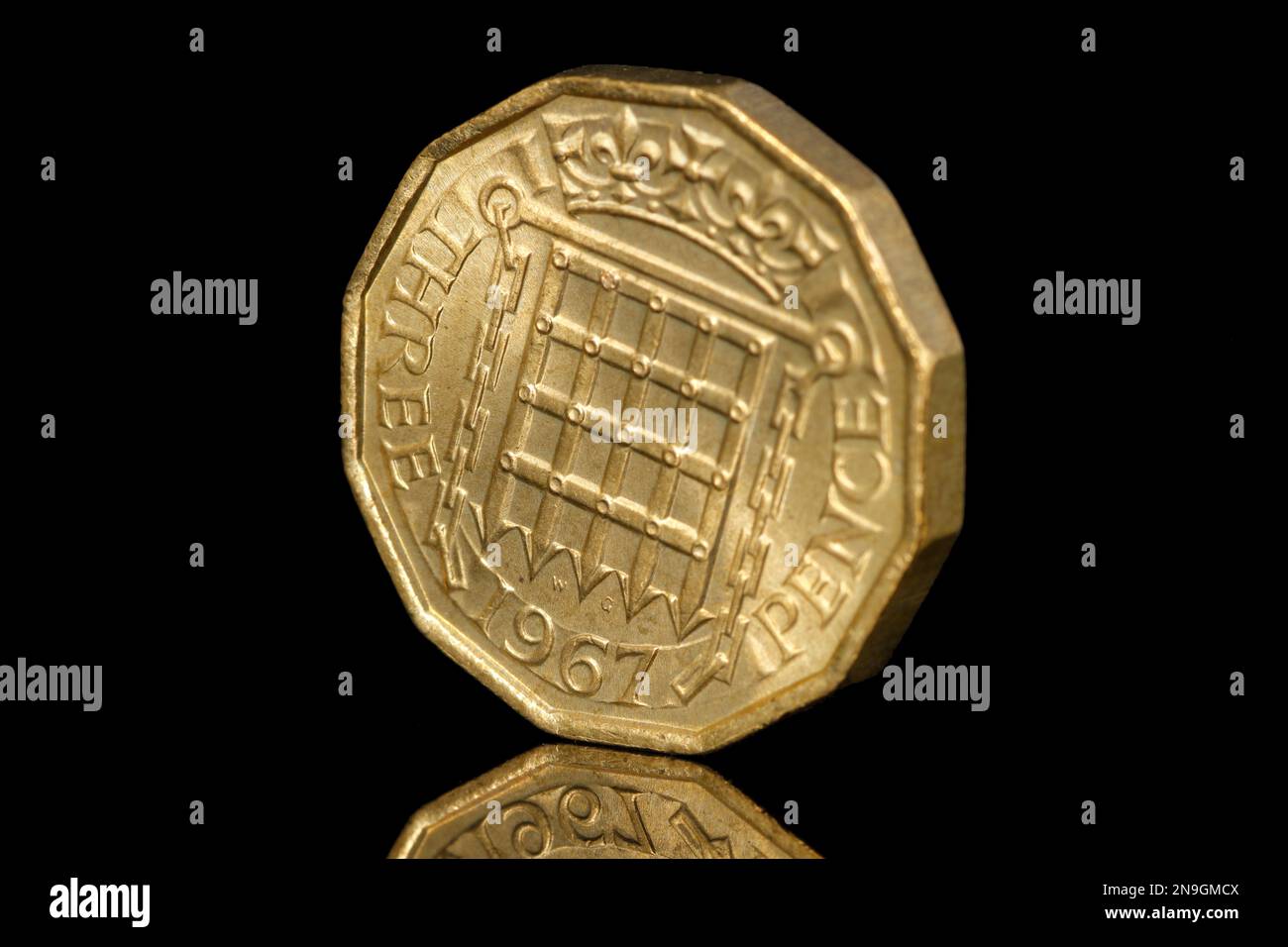 Reverse side of a Threepence coin featuring a crowned portcullis with ...