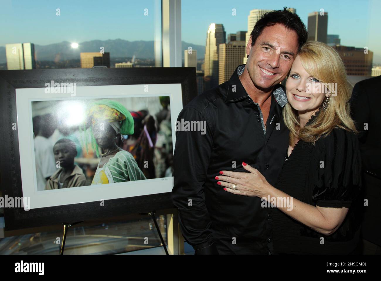 Mark Steines, left, and Jann Carl attend the Mark Steines photography ...
