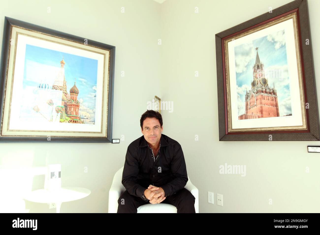 Mark Steines poses for a photo at his photography debut exhibit at The ...