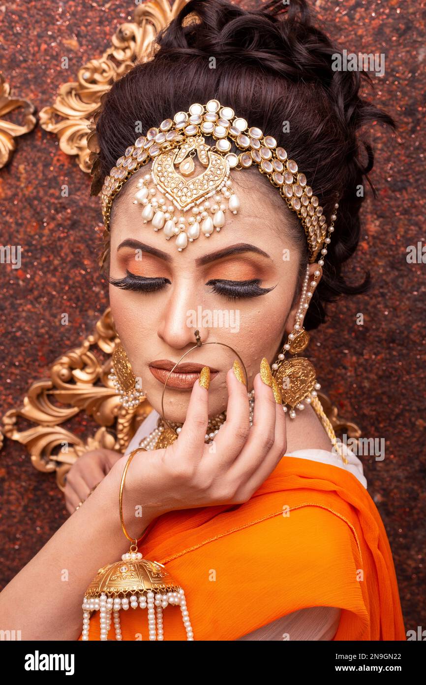 Pakistani. Indian Beautiful bride makeup for saloon shoot Stock Photo ...