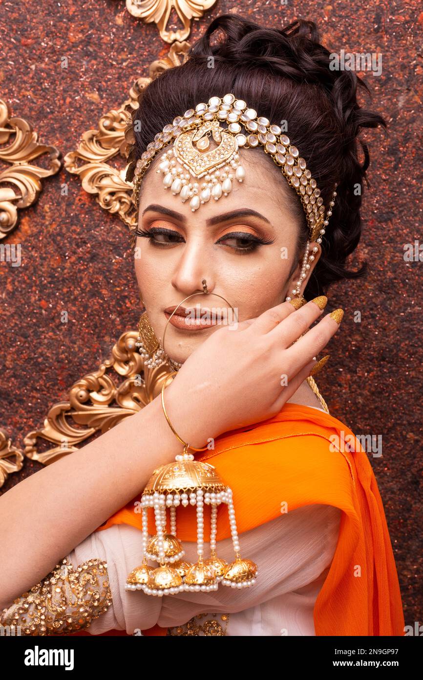 Pakistani. Indian Beautiful bride makeup for saloon shoot Stock Photo ...
