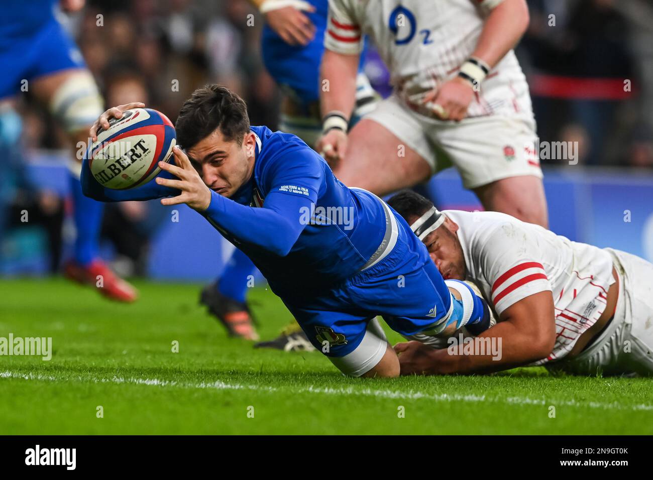 Alessandro Fusco of Italy goes over for a try during the 2023 Guinness ...