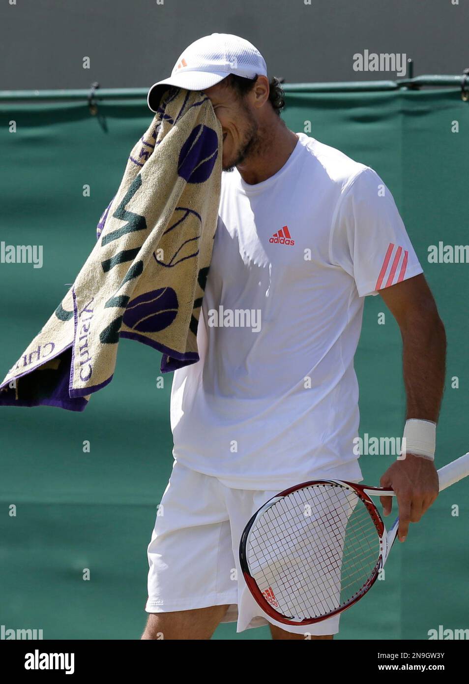 Juan Monaco of Argentina wipes his face during a third round men's ...