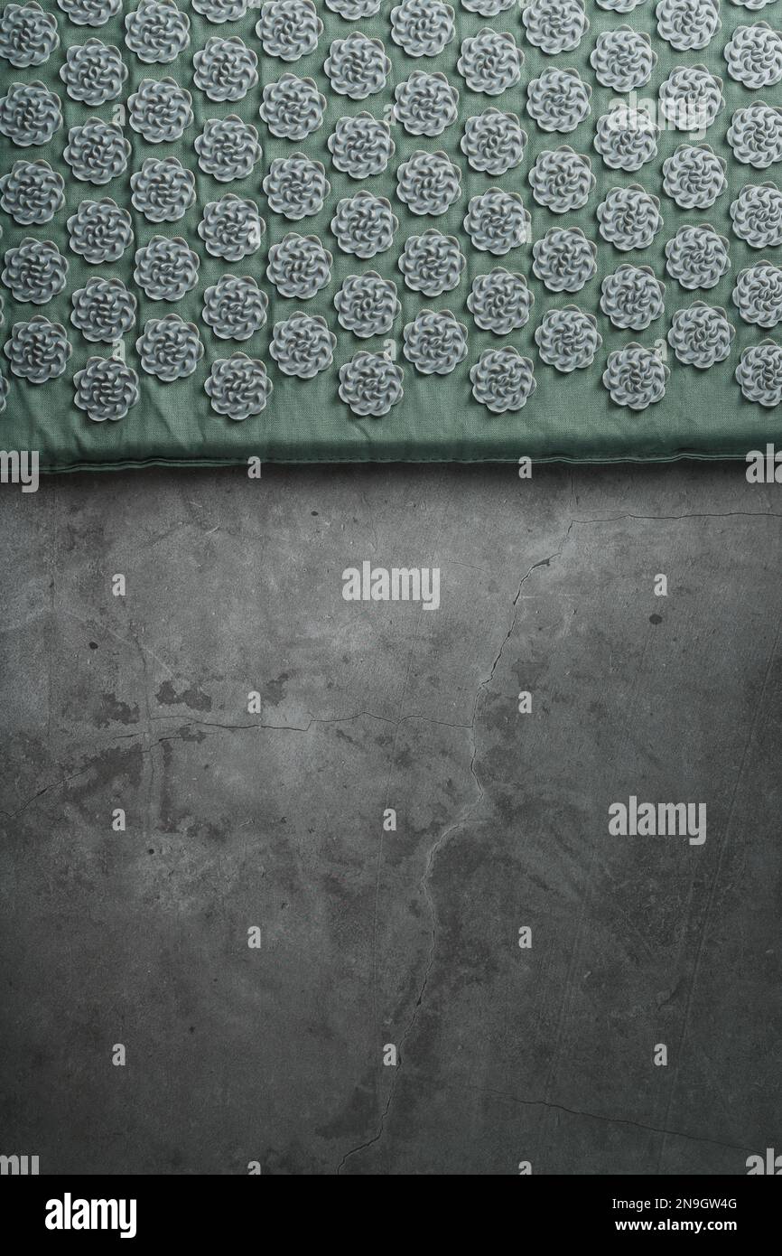 Massage mat with prickly spikes Kuznetsov applicator top view. On a ...