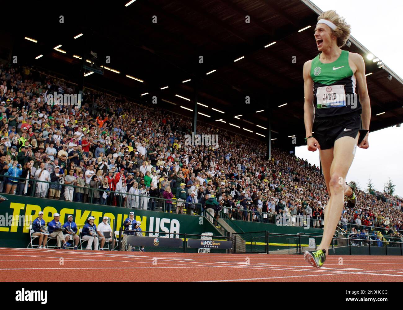 Evan Jager celebrates first place in the men's 3000 meter steeplechase ...