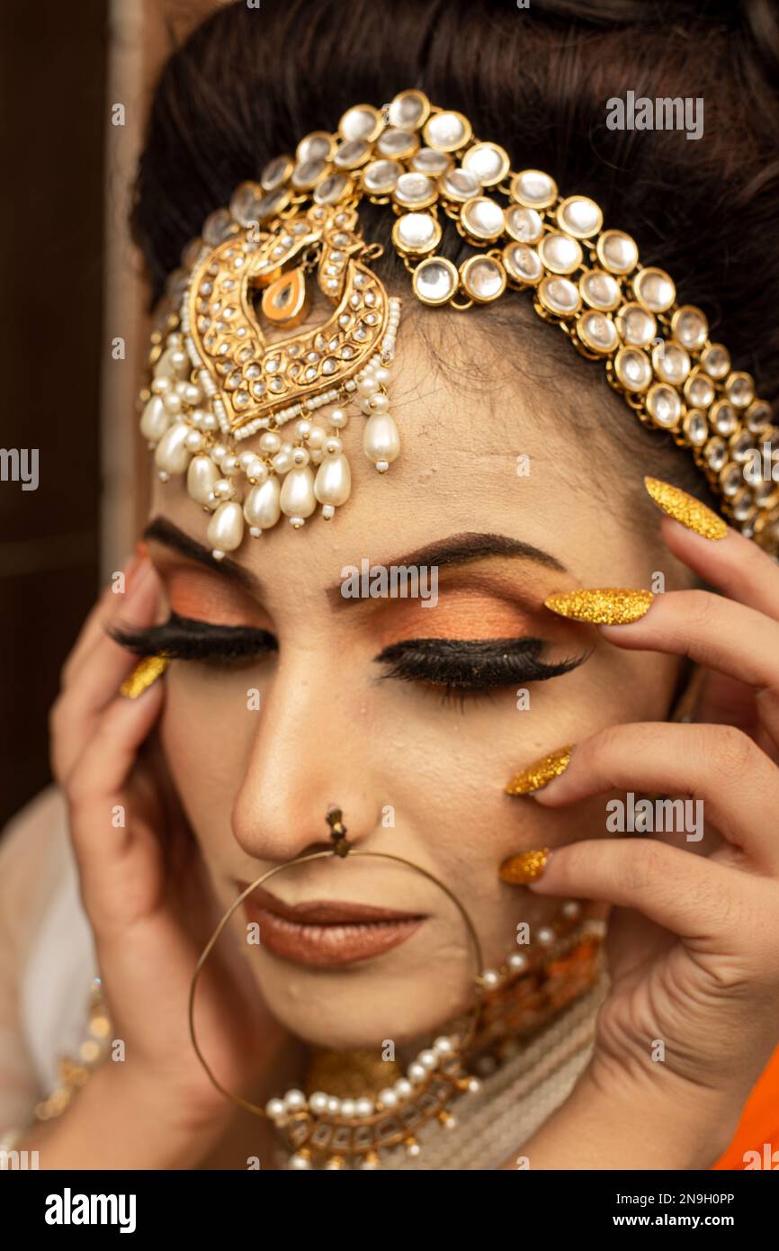 Pakistani. Indian Beautiful bride makeup for saloon shoot Stock Photo ...