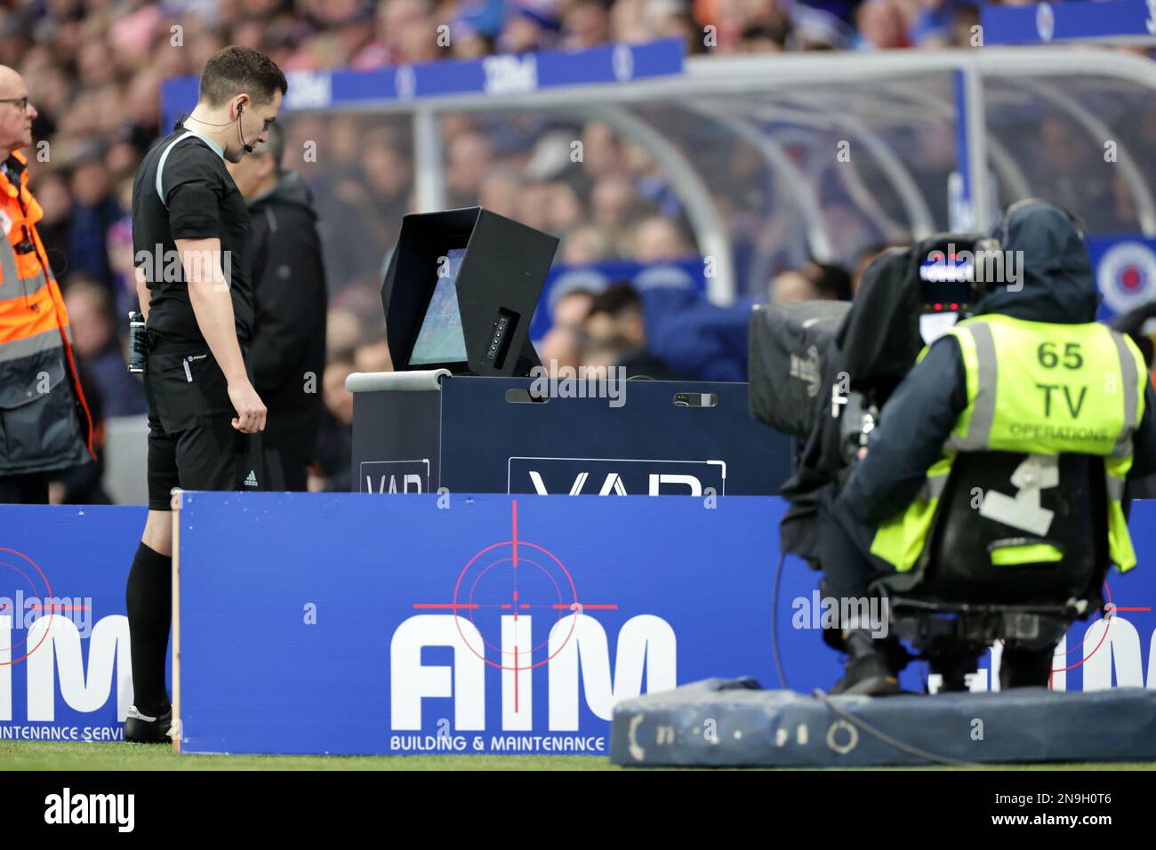 Referee David Munro consults VAR for a handball and awards a penalty to ...