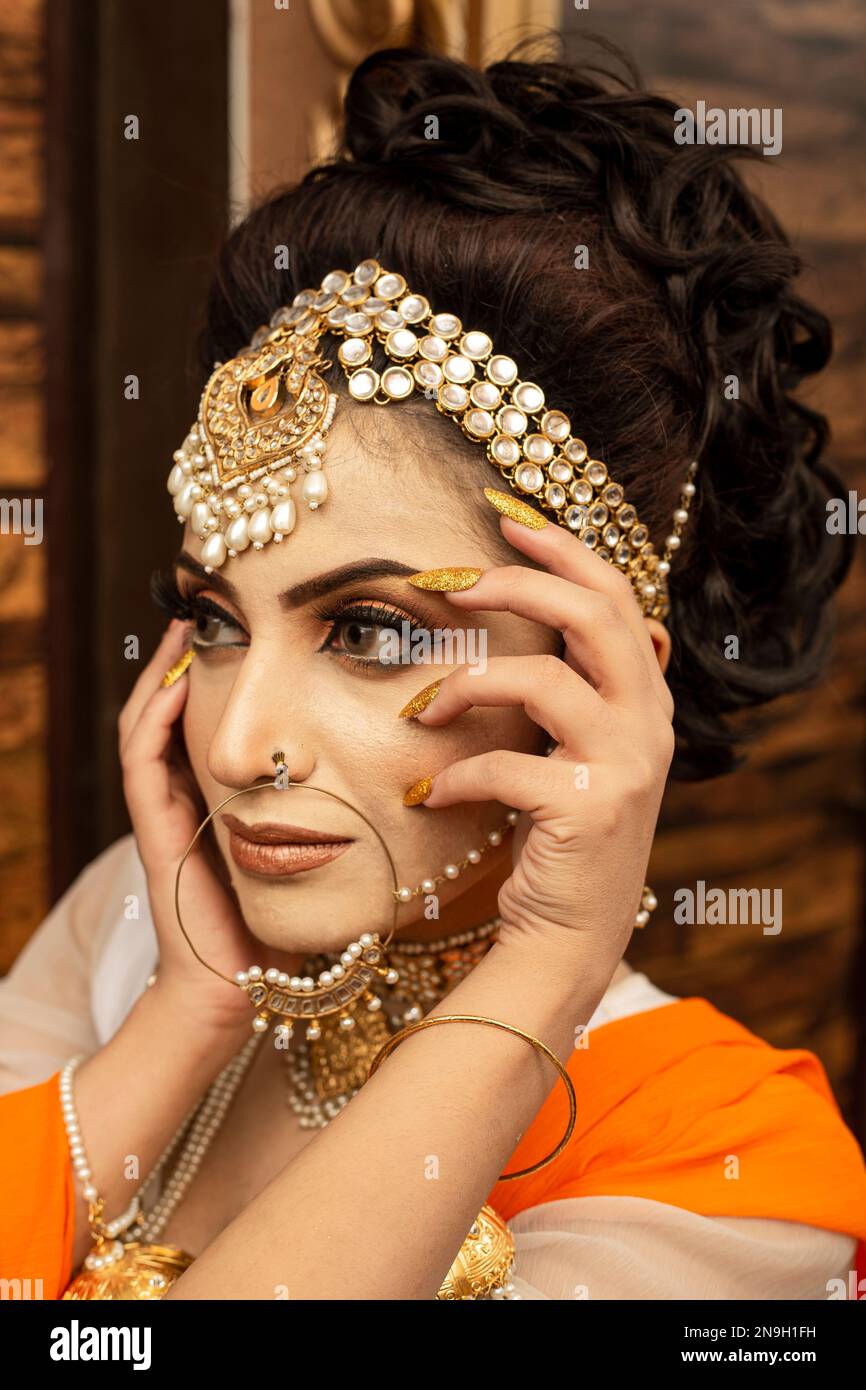 Pakistani. Indian Beautiful bride makeup for saloon shoot Stock Photo ...