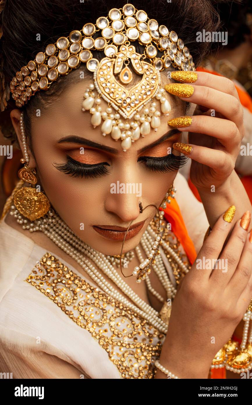 Pakistani. Indian Beautiful bride makeup for saloon shoot Stock Photo ...