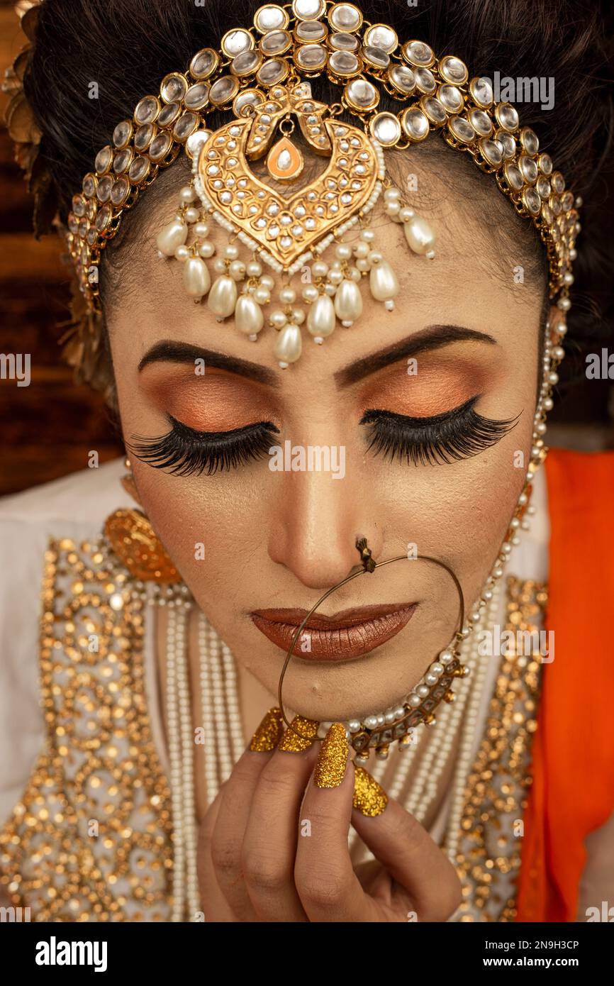 Pakistani. Indian Beautiful bride makeup for saloon shoot Stock Photo ...