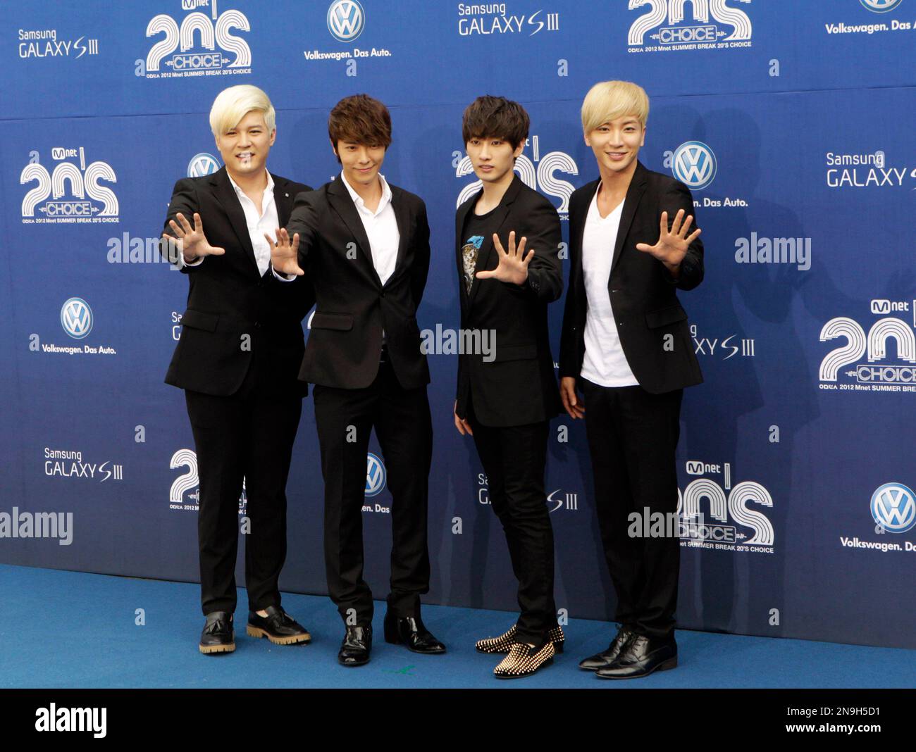 South Korean K-pop group "Super Junior" poses poses before the 2012 Mnet 20's Choice award ...