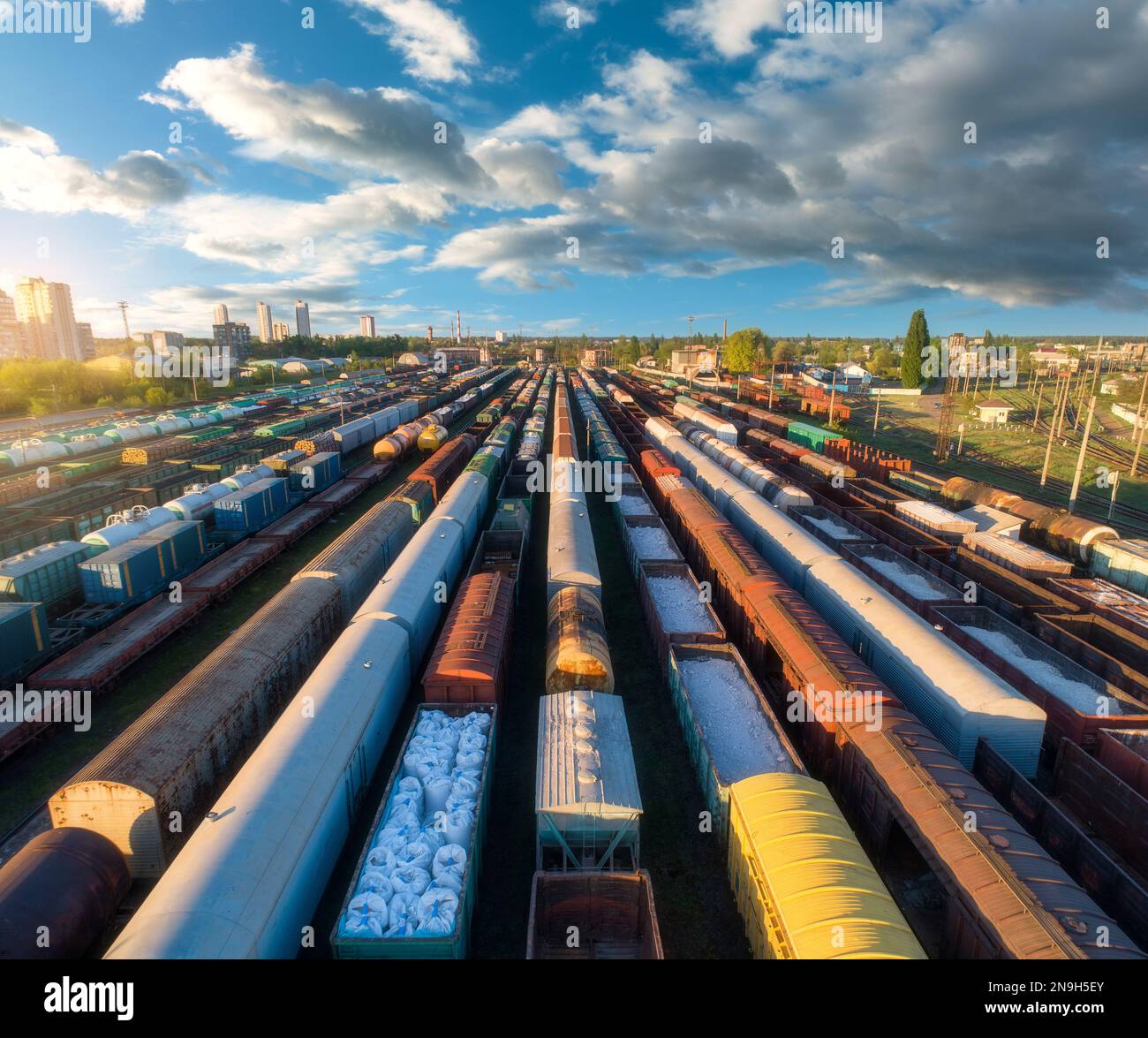 Drone view of freight trains at sunset. Railway cargo wagons Stock ...