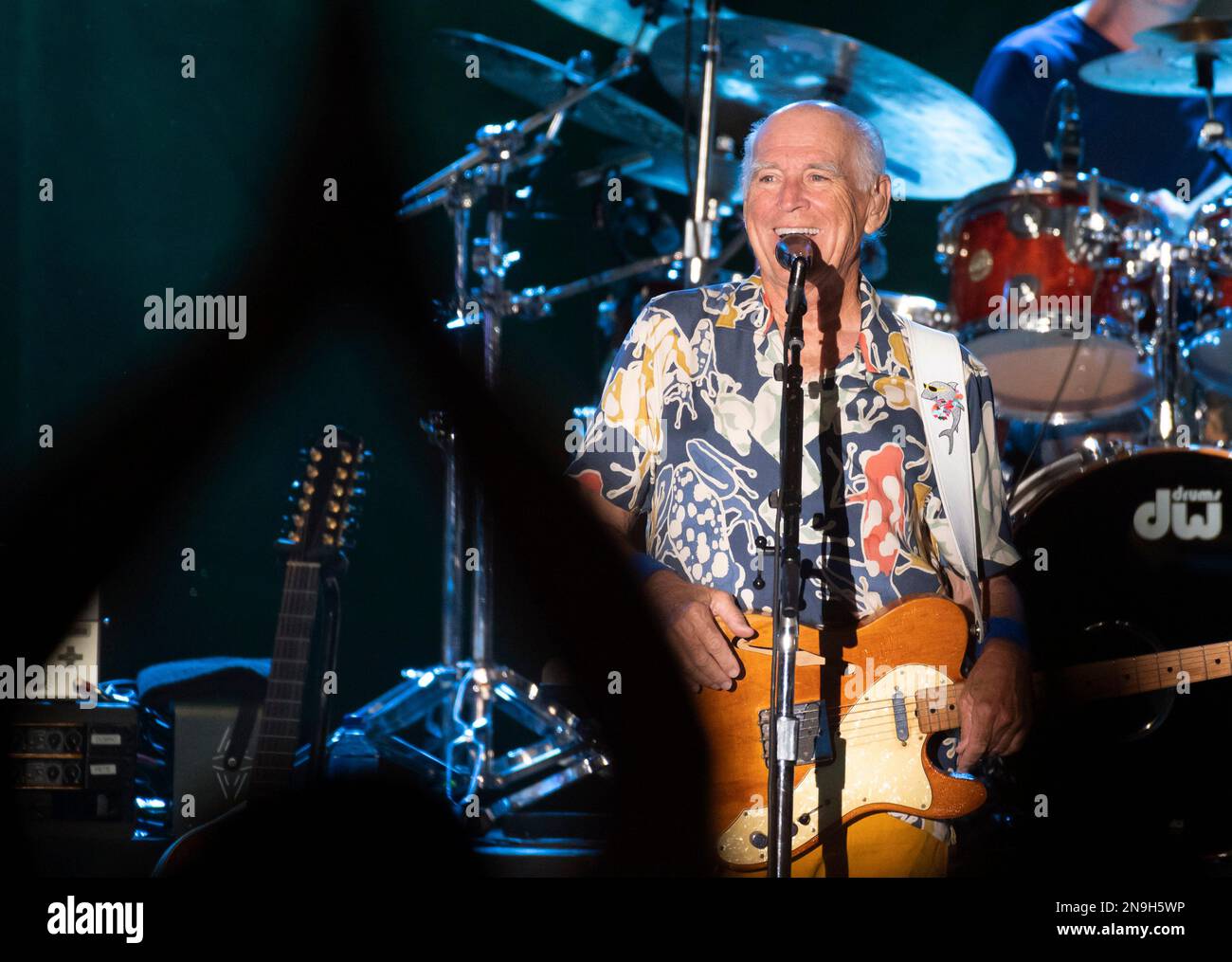 Singer/songwriter Jimmy Buffett interacts with the sold-out crowd ...