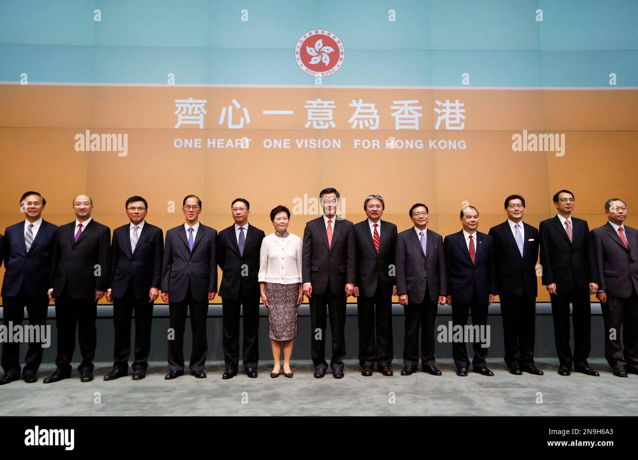 The members of Hong Kong's new cabinet, from left, Secretary for ...